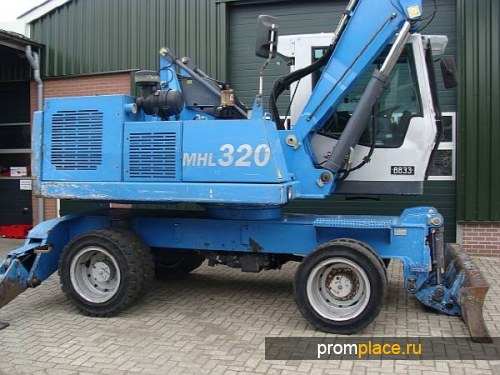 Перегружатель металлолома TEREX-FUCHS 320